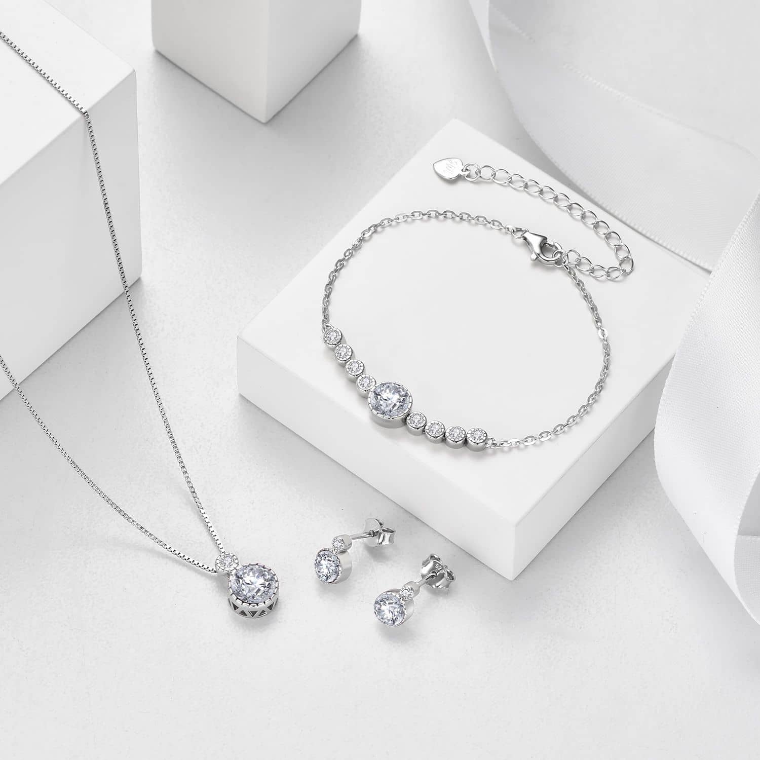 Shop Diamond White Colour Solitaire Jewellery Set (Necklace, Bracelet ...